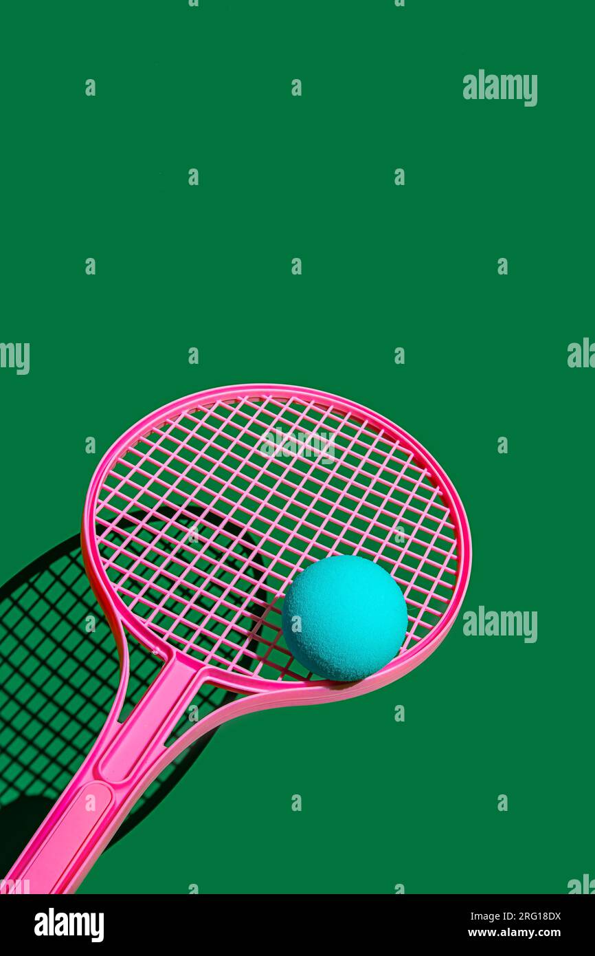Pink Tennis Racket And Ball