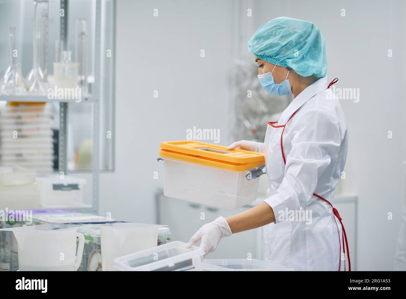 Female scientist conducts experiments in hi-res stock photography and ...
