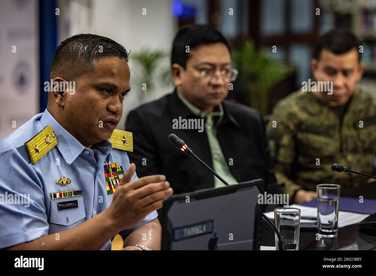 Commodore Jay Tarriela, left, Philippine Coast Guard spokesperson for ...
