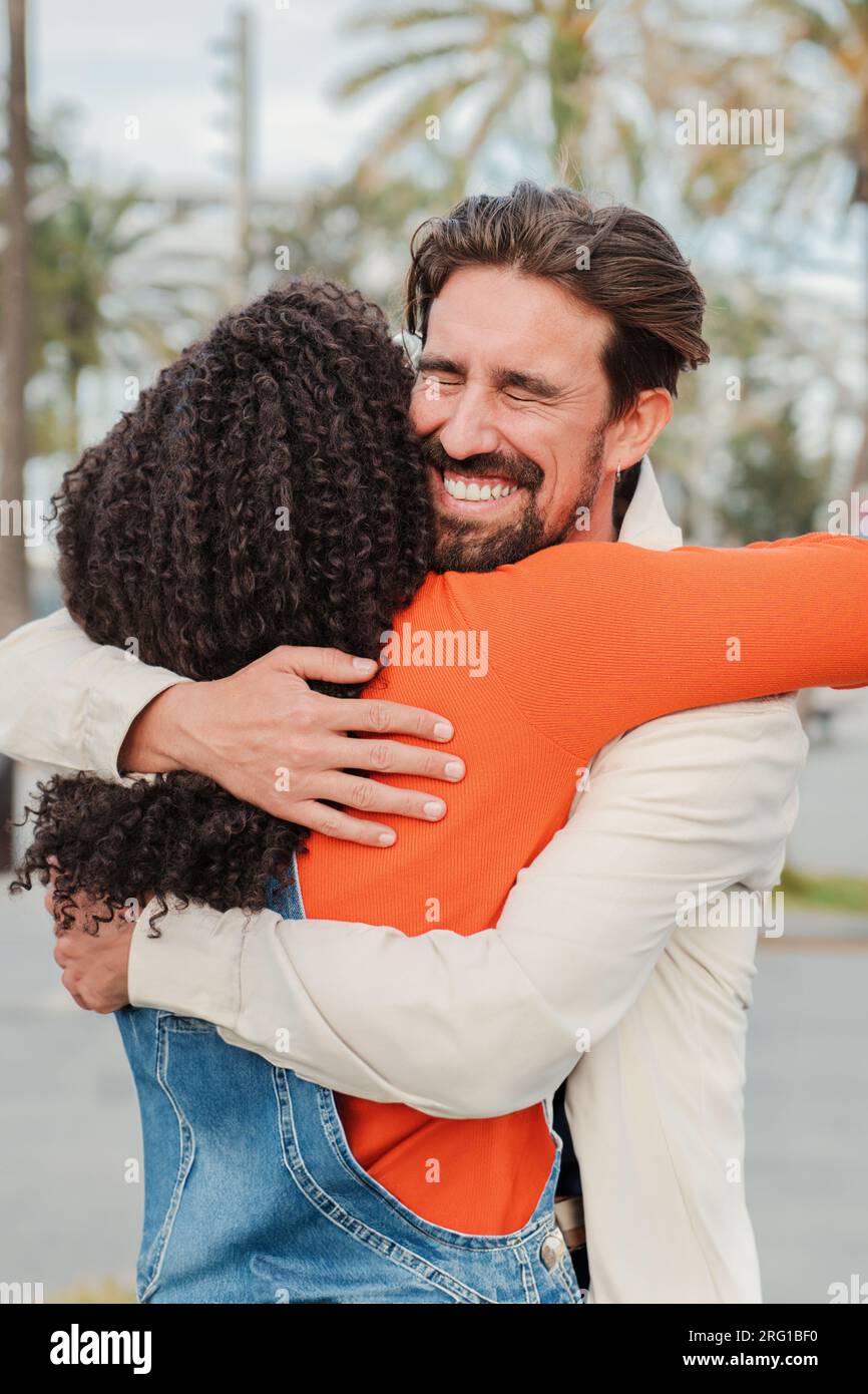 Vertical portrait. Passionate encounter of a couple in love embraced ...