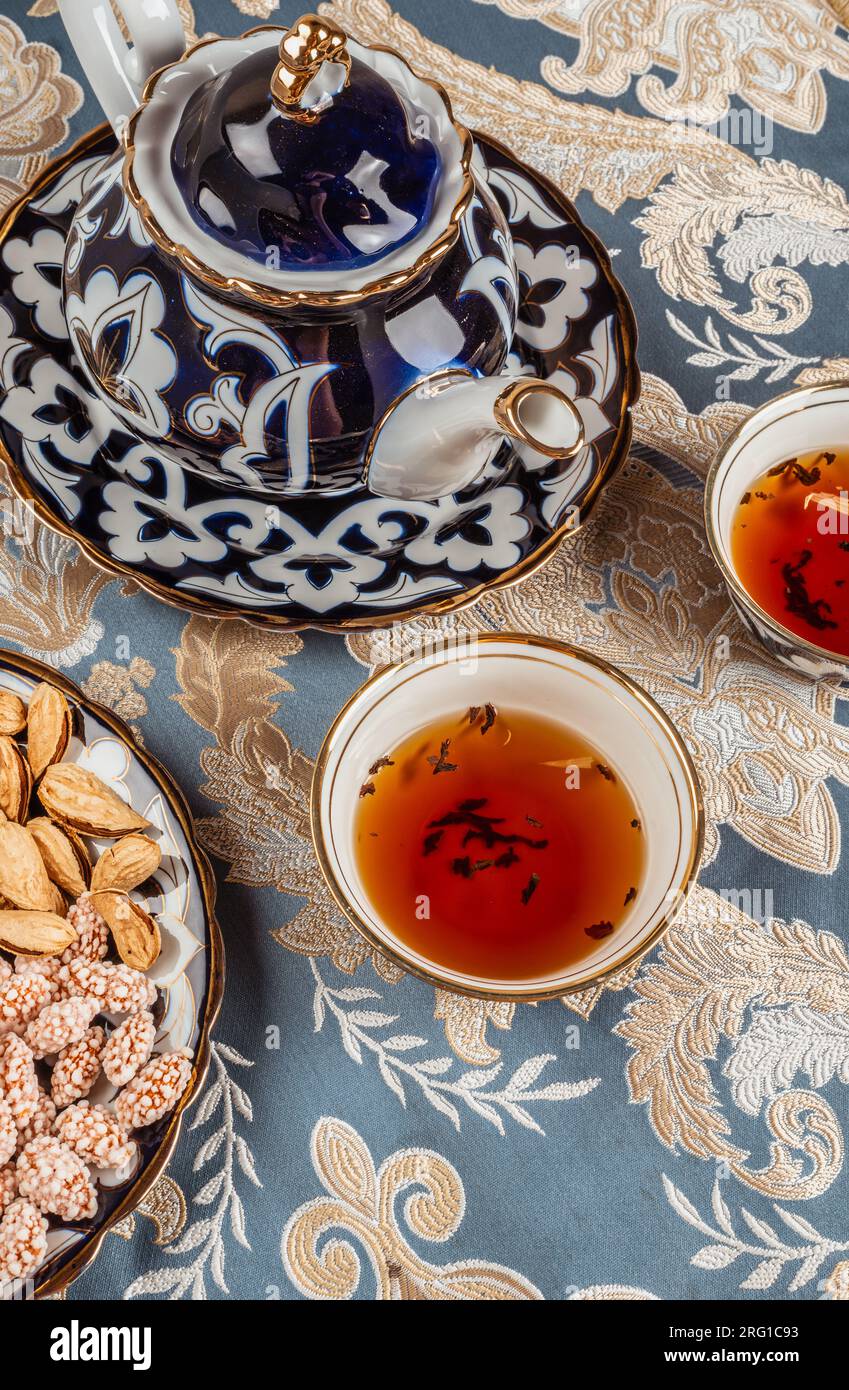 traditional uzbek tea with nuts Stock Photo - Alamy