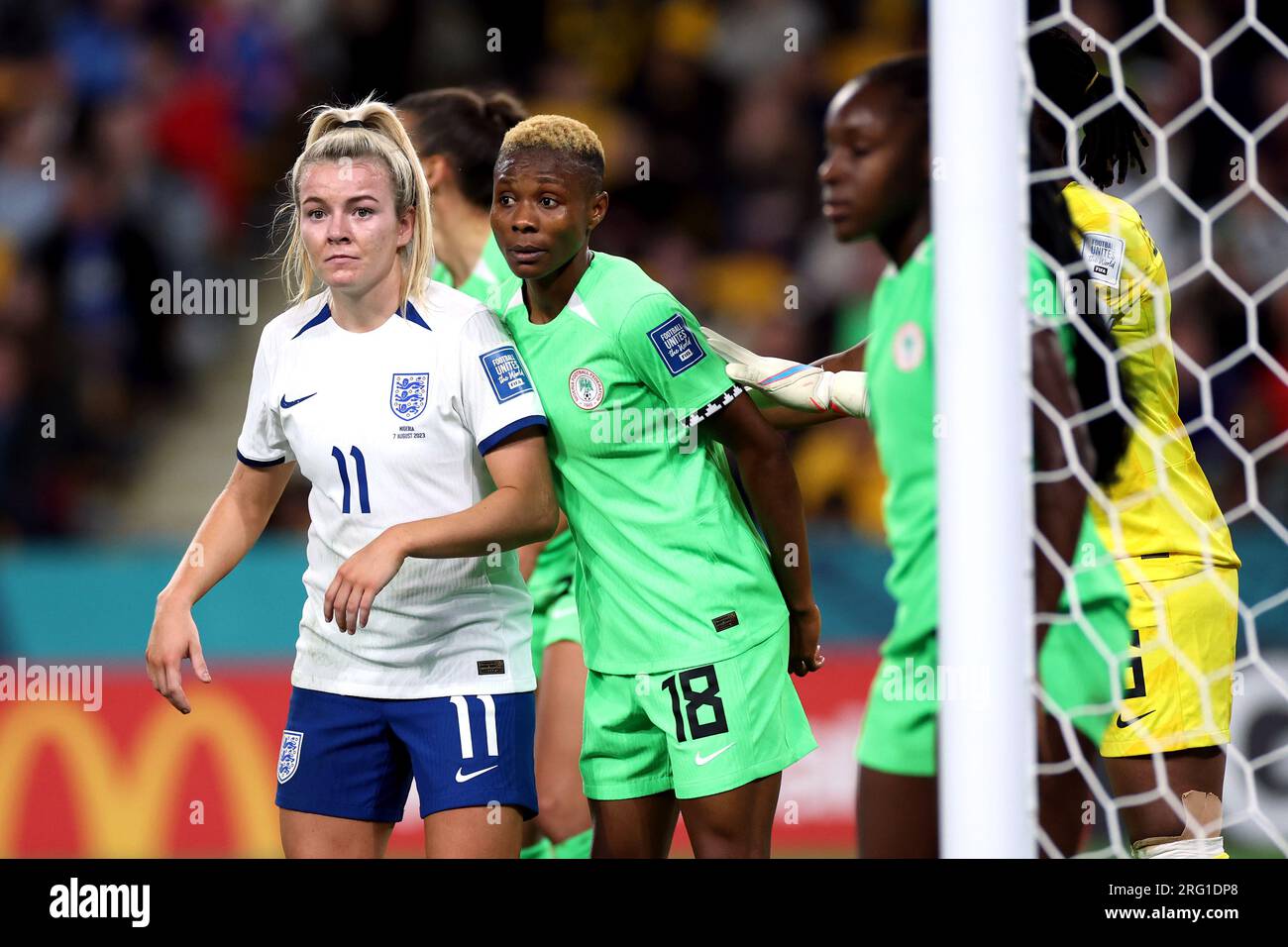 England's Lauren Hemp (left) and Nigeria's Halimatu Ayinde prior to a ...