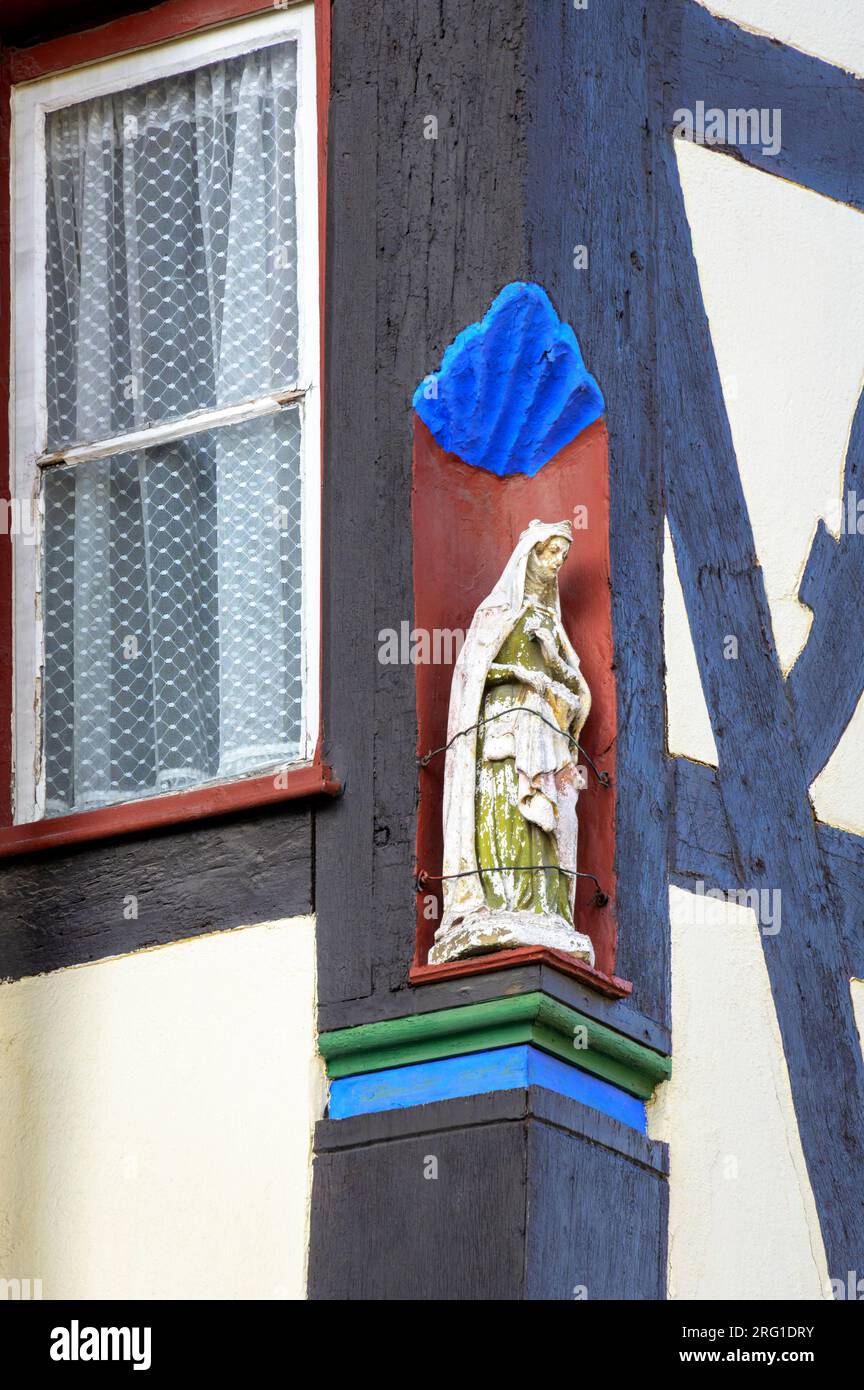 Statue of Maria on the corner of a typical house at the Moesel, Germany ...