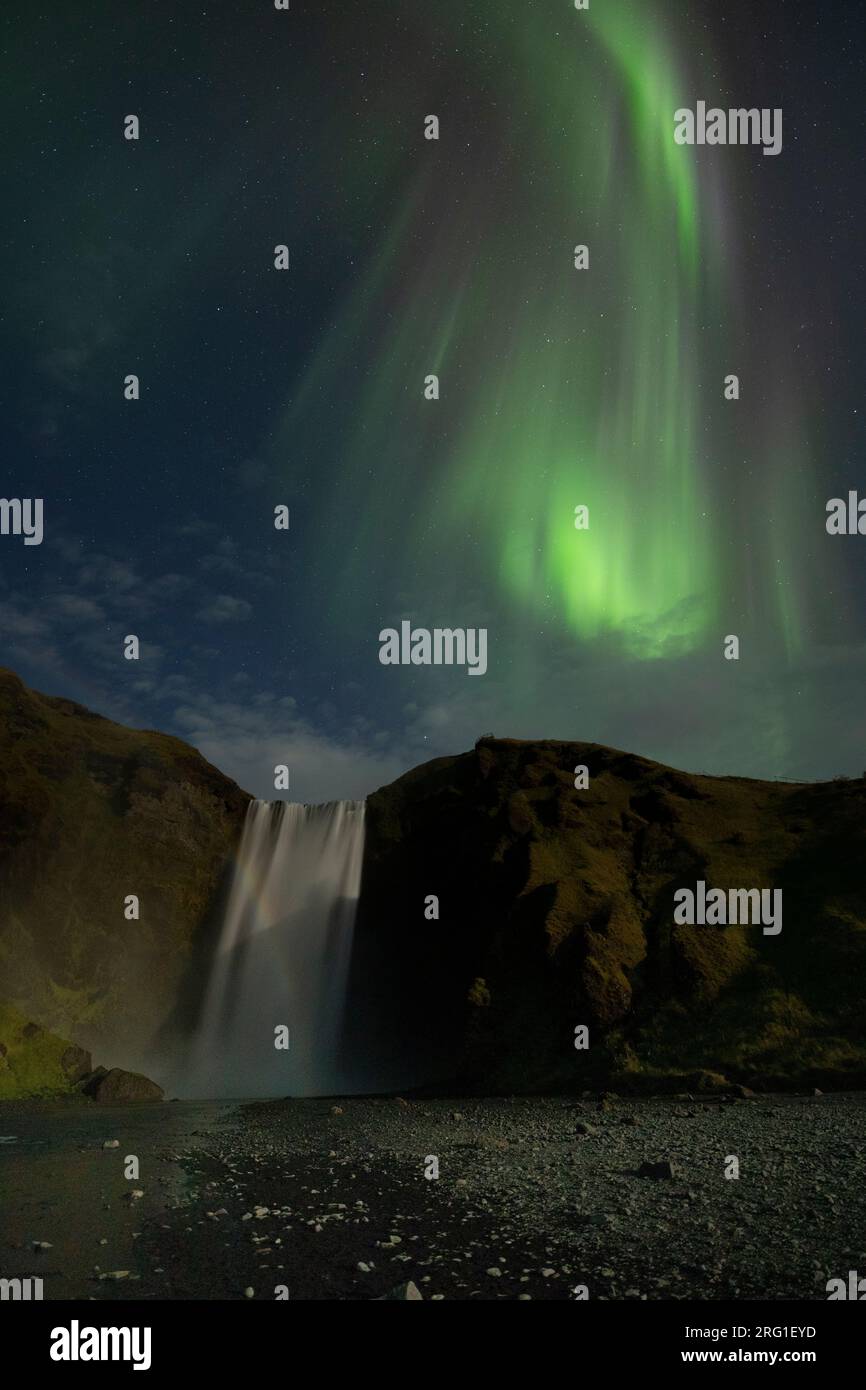 Aurora Borealis over Skogafoss with a rainbow of moon Stock Photo - Alamy