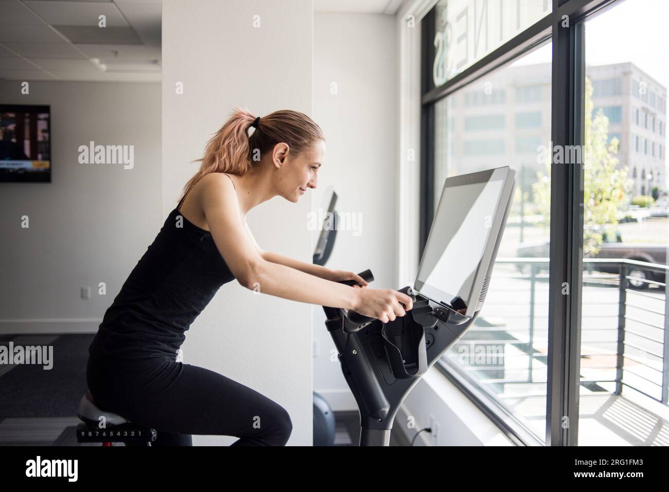 Focused woman working out gym hi-res stock photography and images - Alamy