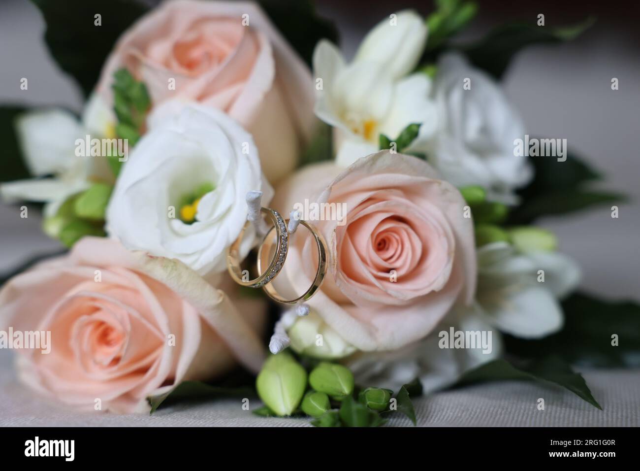 Closeup two wedding rings hi-res stock photography and images - Alamy