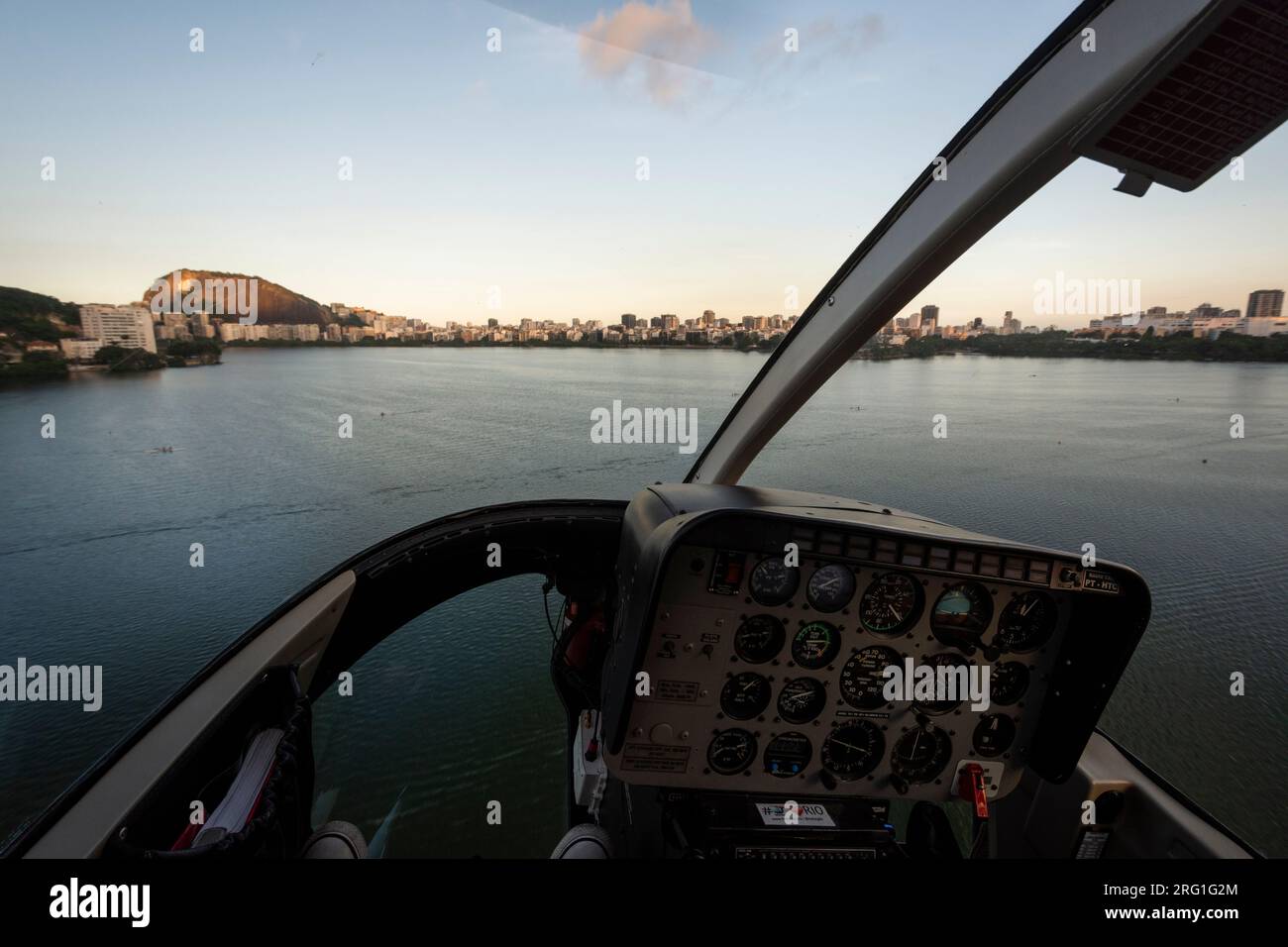 Aerial view from helicopter cockpit flying over city lagoon Stock Photo ...
