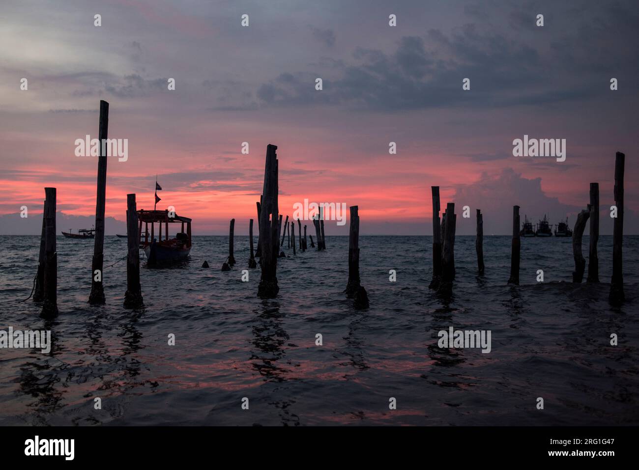 View of a local pier at sunset time in Koh Rong Island, Cambodia Stock ...