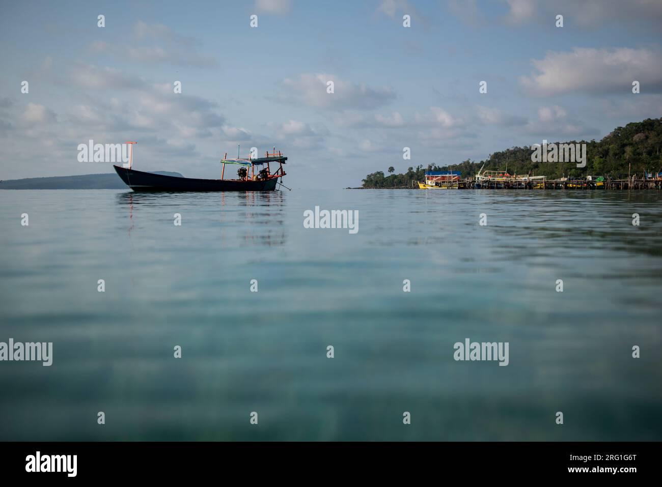 Low perspective view of traditional fishing boats at the Tui beach of ...