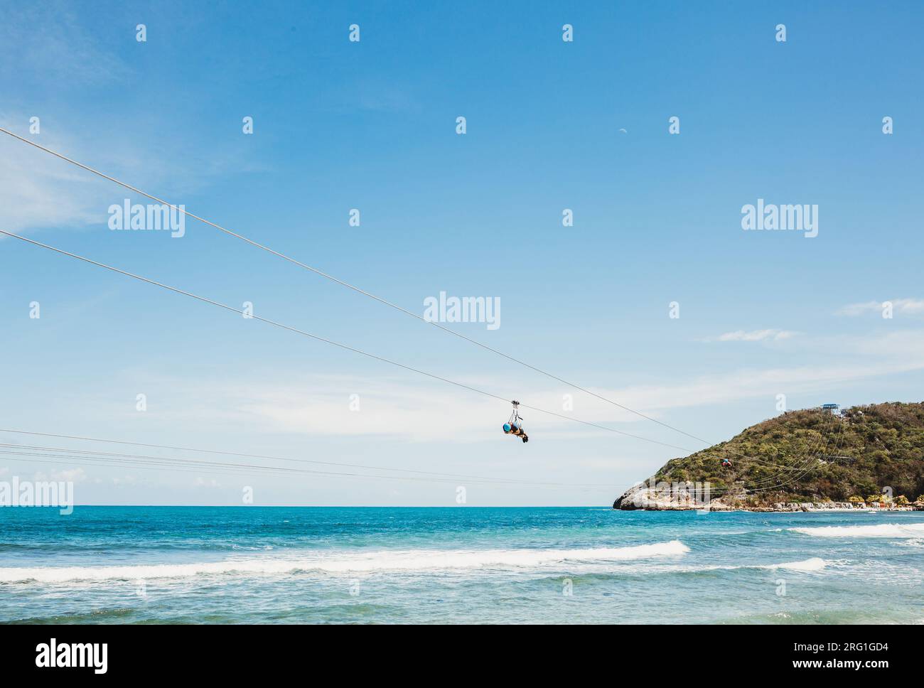 Zip lining over the Gulf of Mexico Stock Photo - Alamy