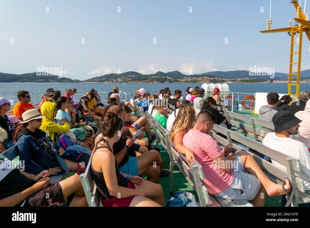 Passengers on board Mar de Ons ferry boat from the Cies Islands to Vigo ...