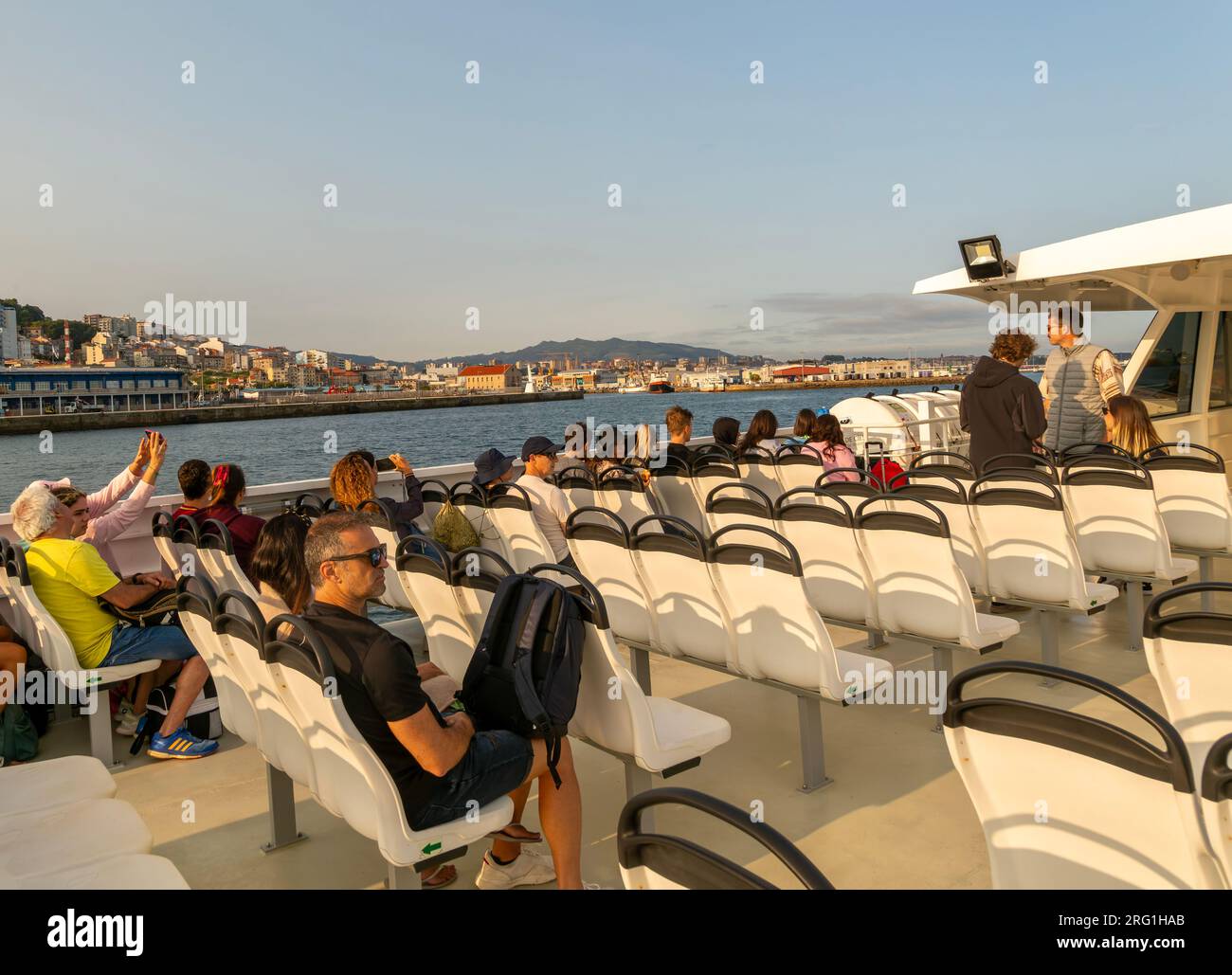 Passengers on board Mar de Ons ferry boat to the Cies Islands from city ...