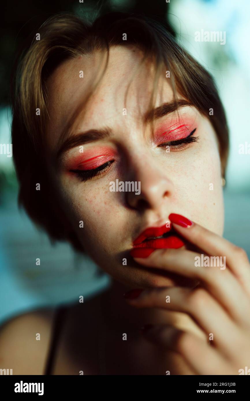 Woman face red lips hi-res stock photography and images - Alamy