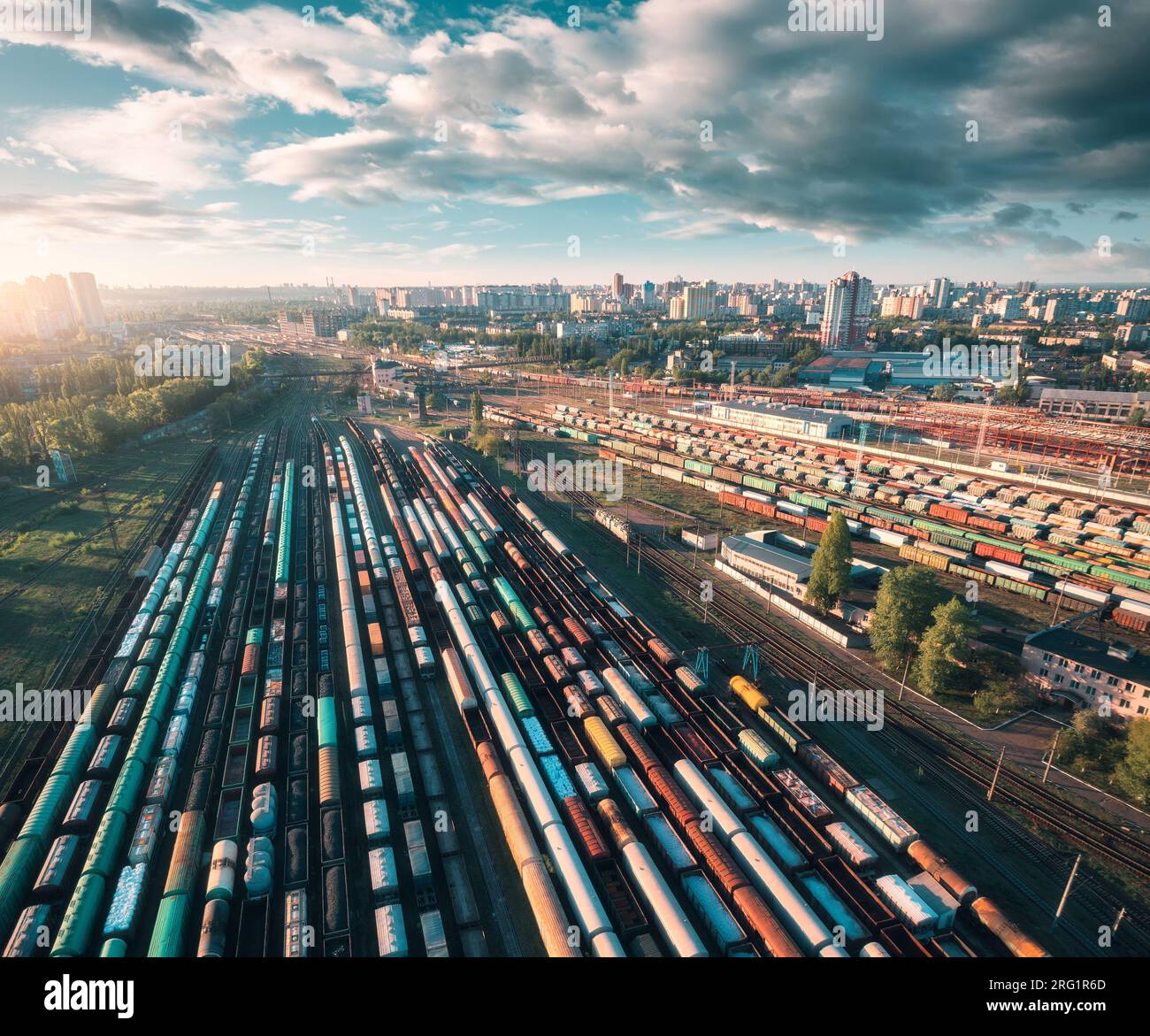Aerial view of freight trains at sunset. Railway cargo wagons Stock ...