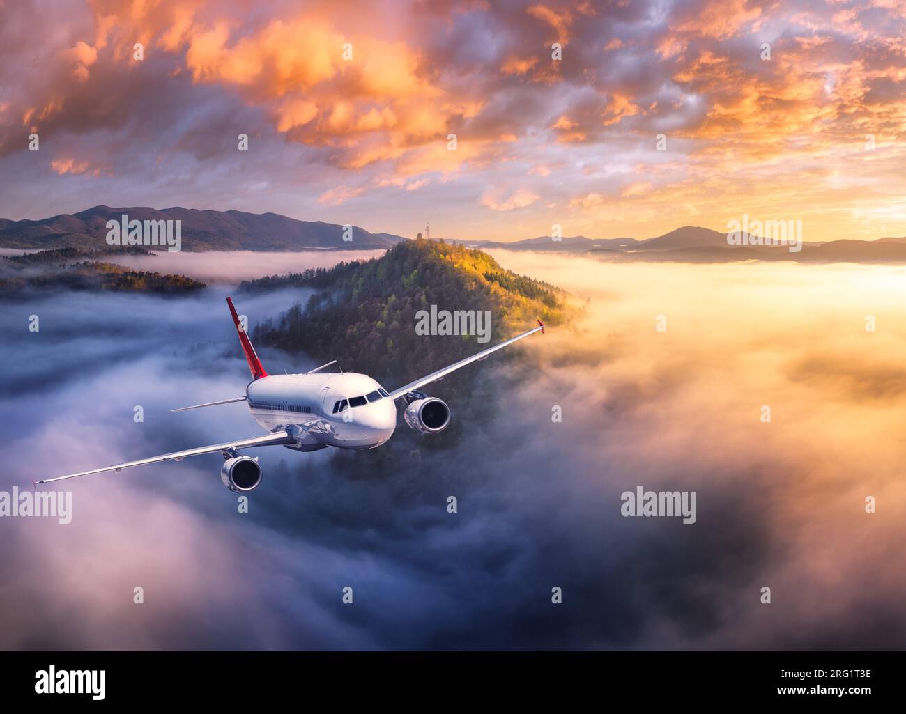 Aeroplane flying over mountain peak hi-res stock photography and images ...