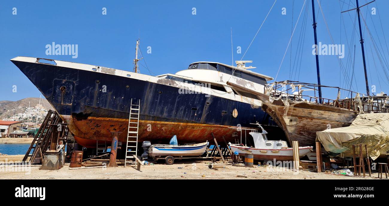 Sailing ships in a shipyard, Ermopouli harbor, Syros island, Greece ...