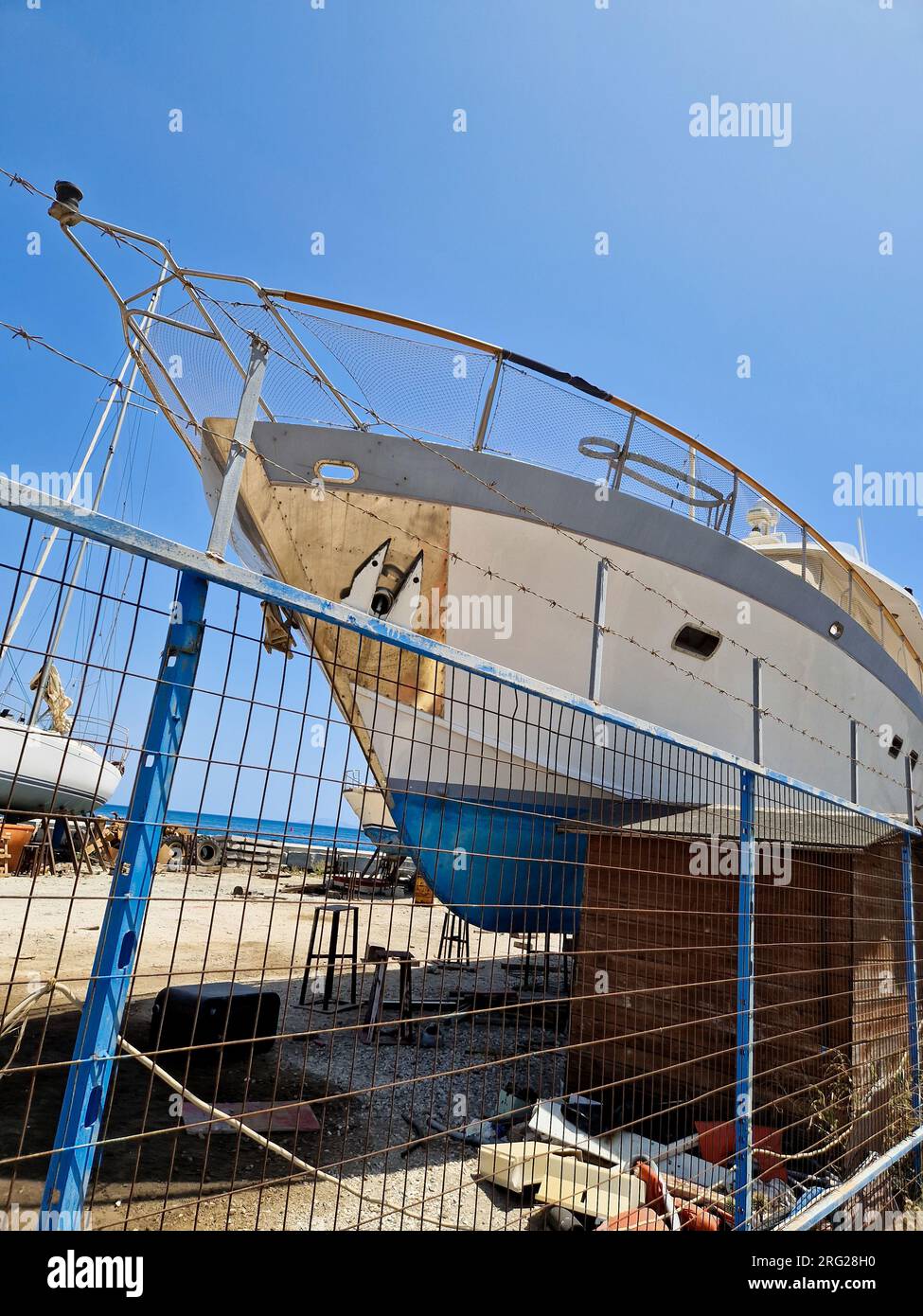 Sailing ships in a shipyard, Ermopouli harbor, Syros island, Greece ...
