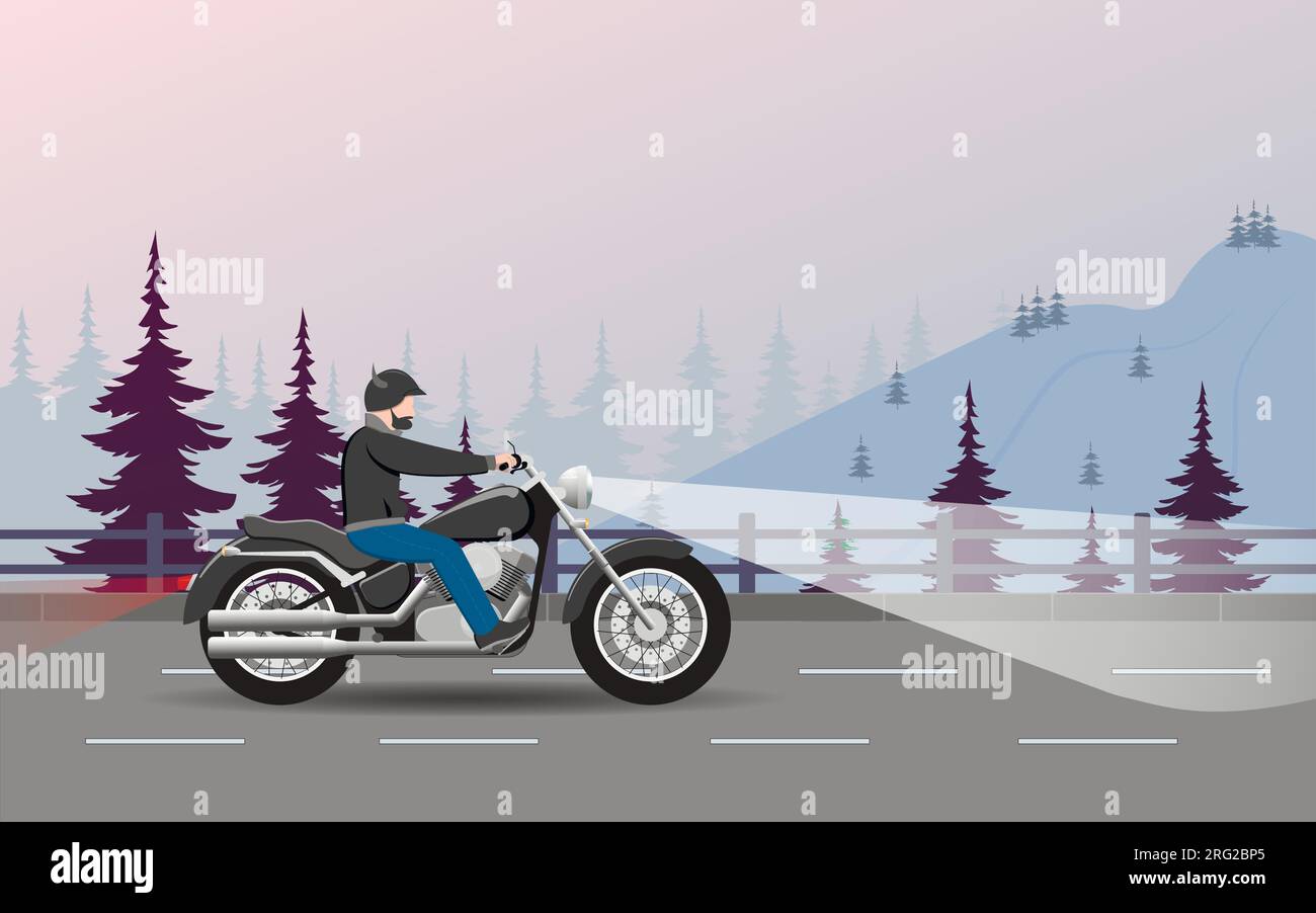 A motorcyclist slowly rides on the road to meet the wind on the road ... A motorcyclist slowly rides on the road to meet the wind on the road ...