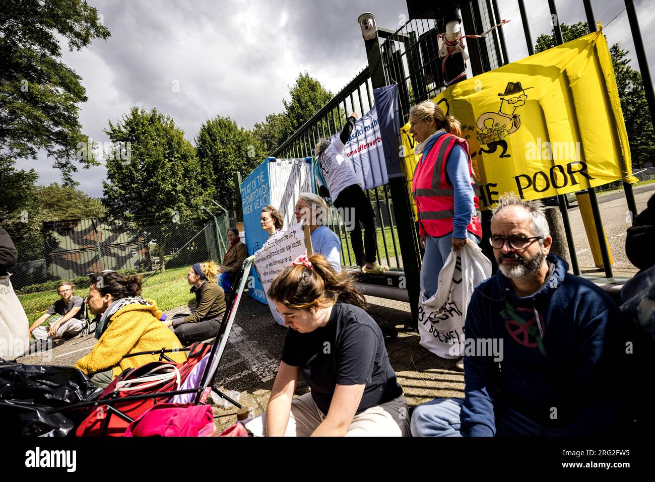 VOLKEL - Activists block the entrance to Volkel Air Base in protest ...