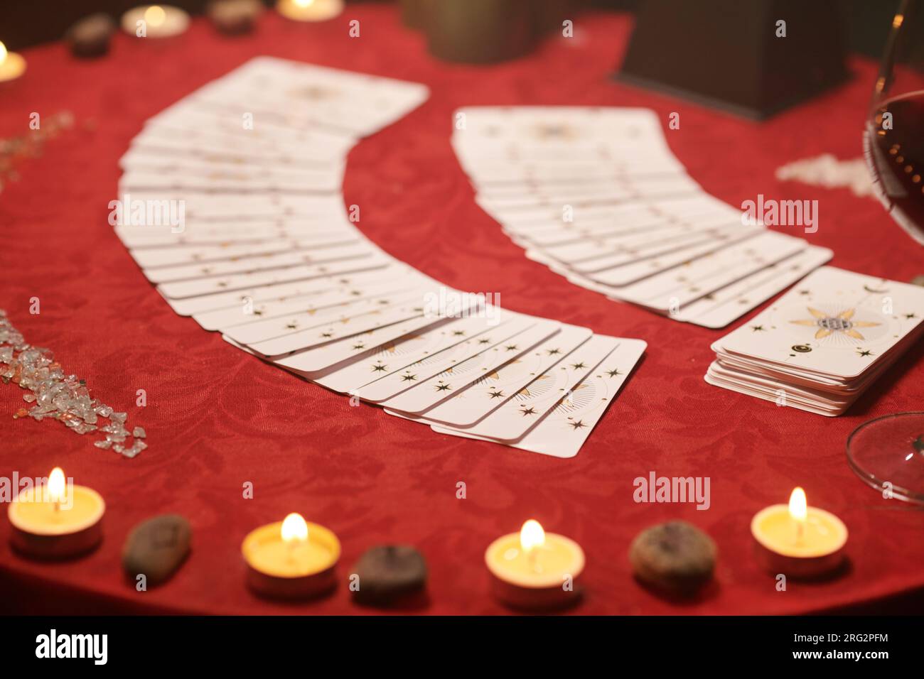 Tarot cards spread on table hi-res stock photography and images - Alamy