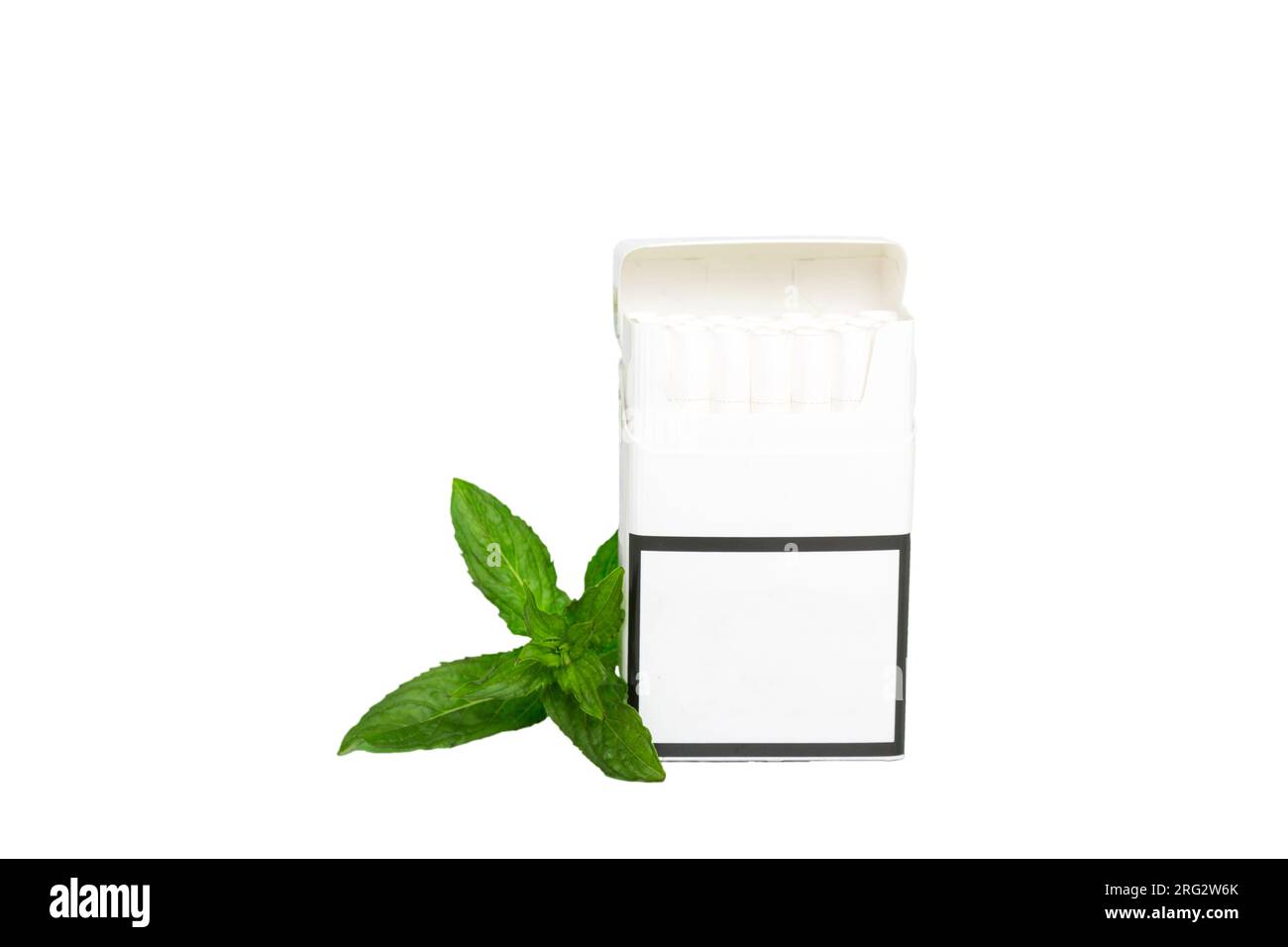 Pack of menthol cigarettes and fresh mint on colored table, Menthol ...