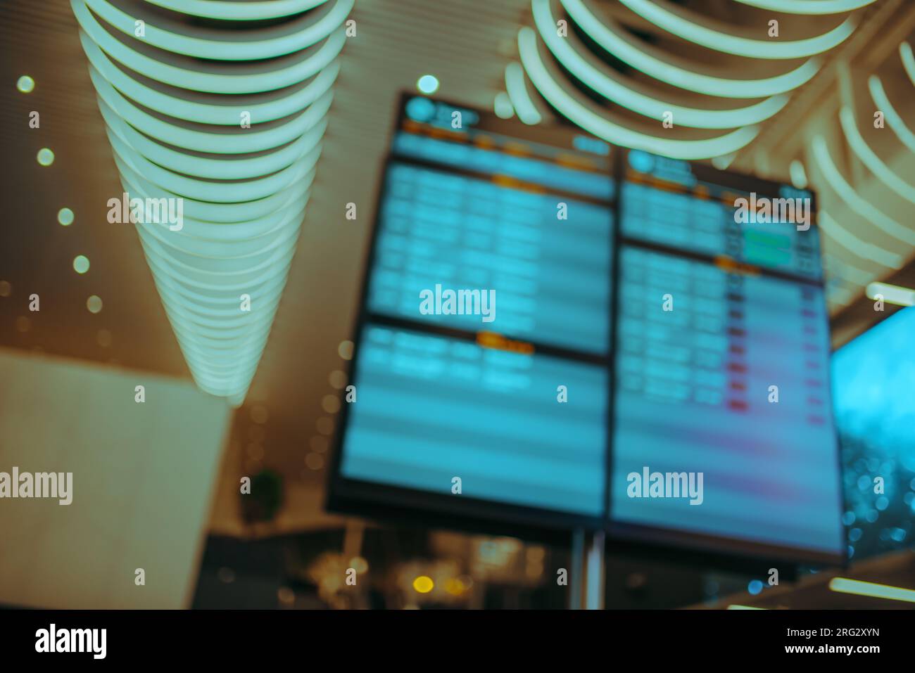 Departure board at airport, abstract out of focus background Stock ...