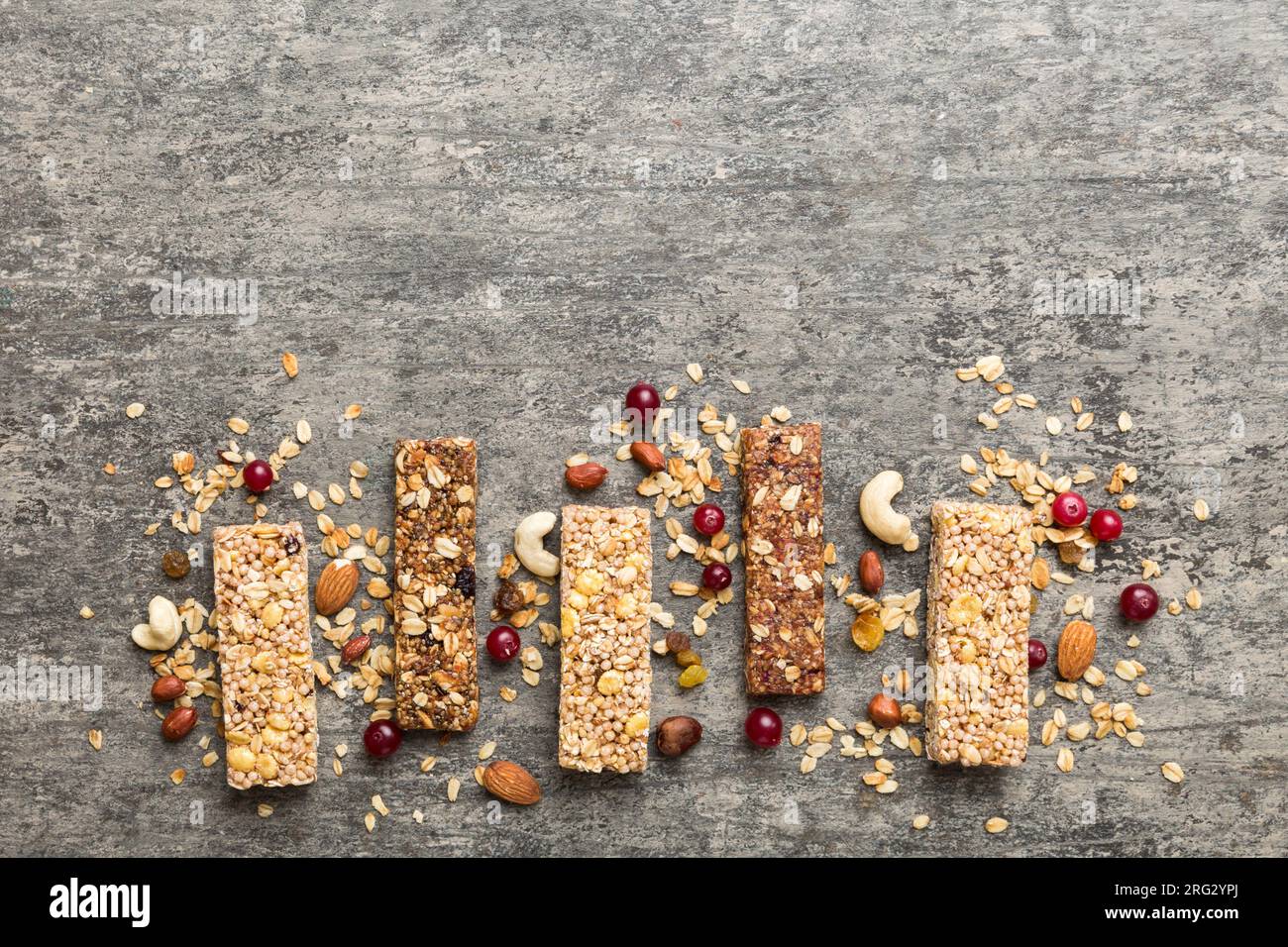 Various granola bars on table background. Cereal granola bars ...
