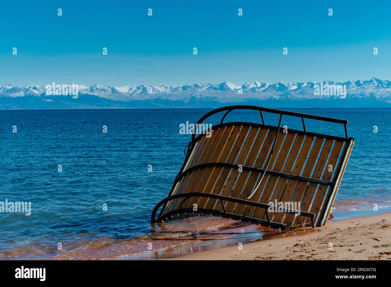 Overturned sun lounger on the beach after the storm Stock Photo - Alamy