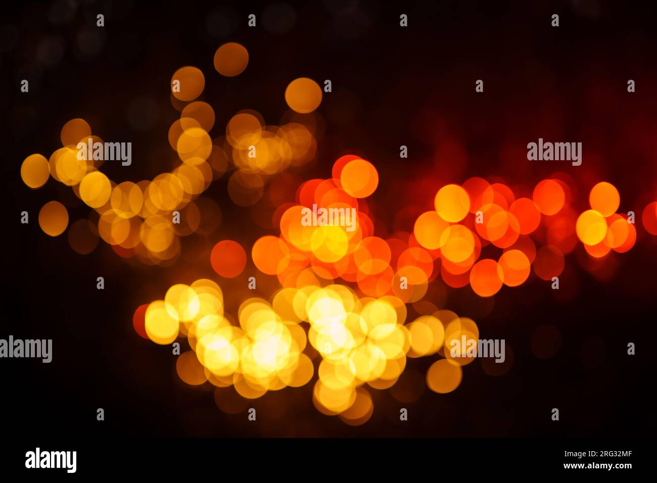 Abstract dark background with defocused lights Stock Photo - Alamy