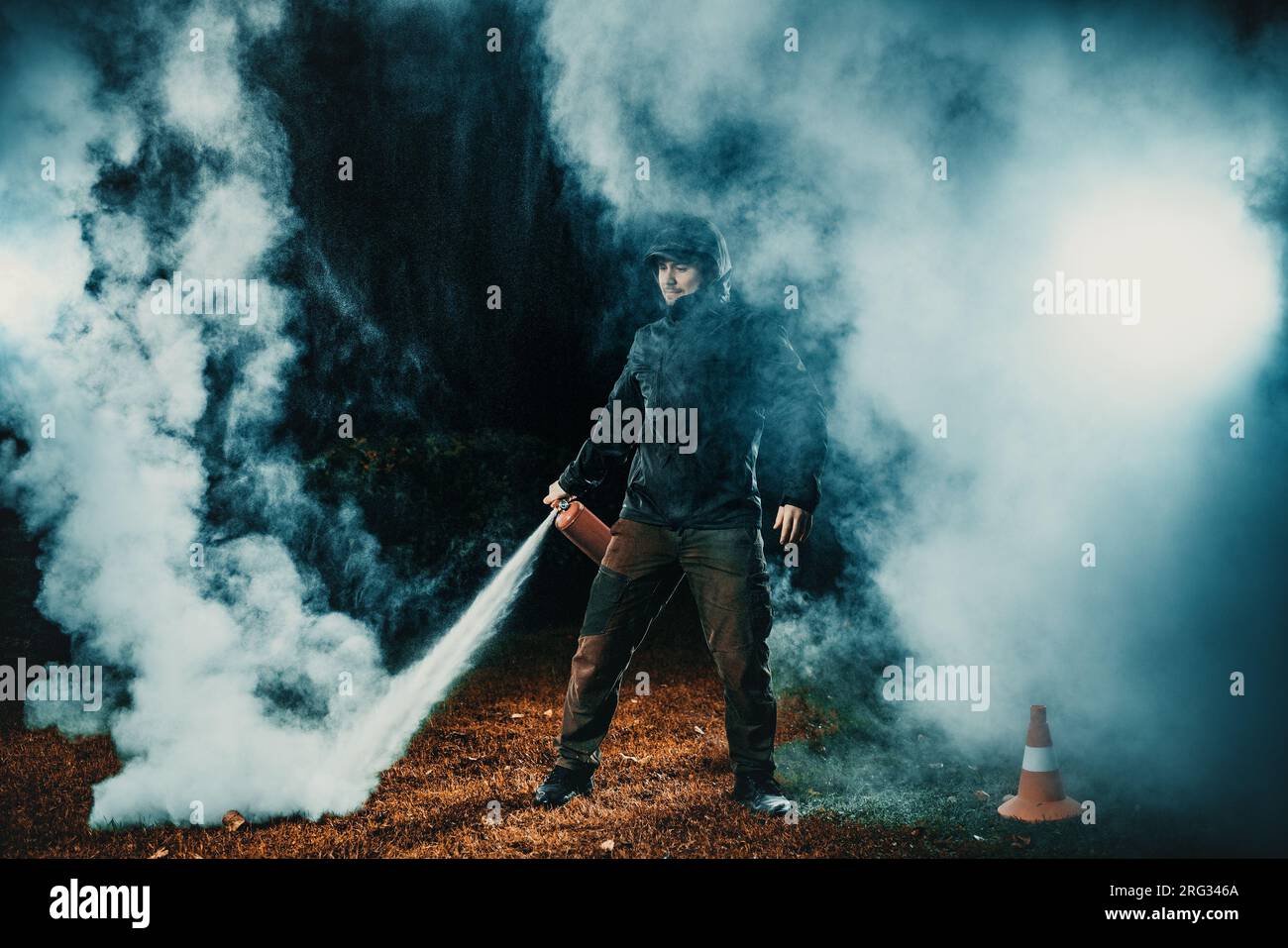 Man with fire extinguisher hi-res stock photography and images - Alamy
