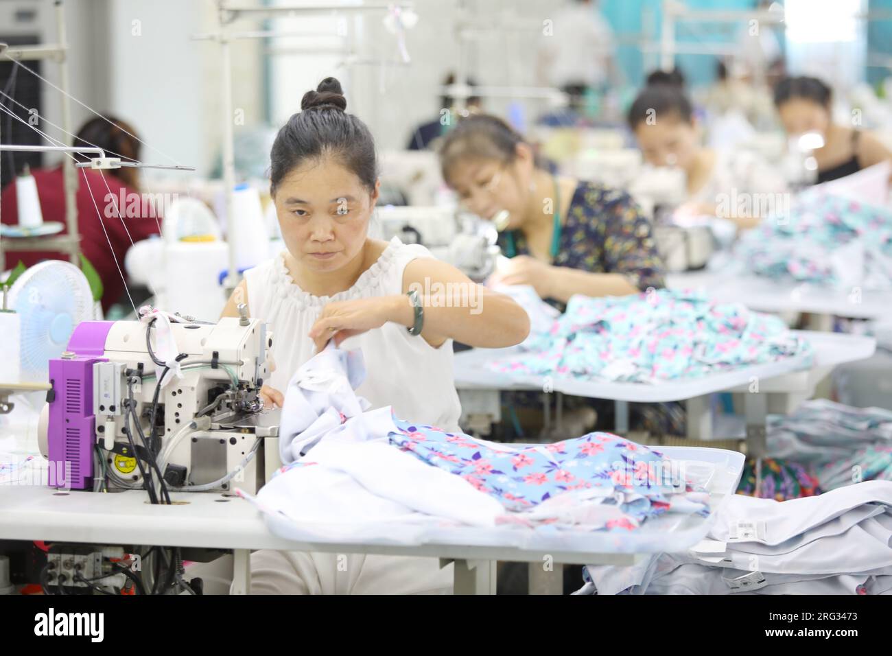 CHONGQING, CHINA - AUGUST 7, 2023 - Workers sew swimsuits for export at ...