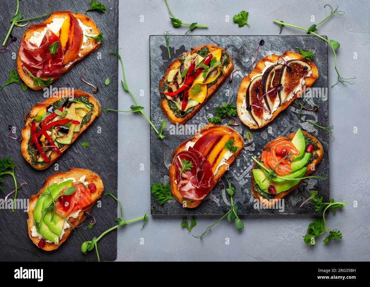 Set of assorted bruschetta with various toppings for holiday on the ...