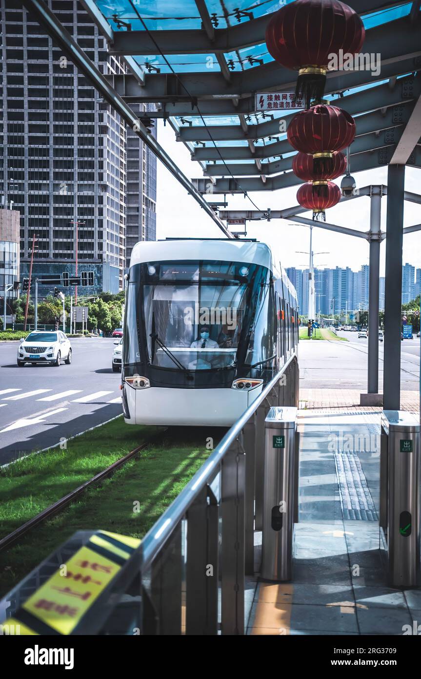 Chinese streets, transportation, tram and station Stock Photo - Alamy