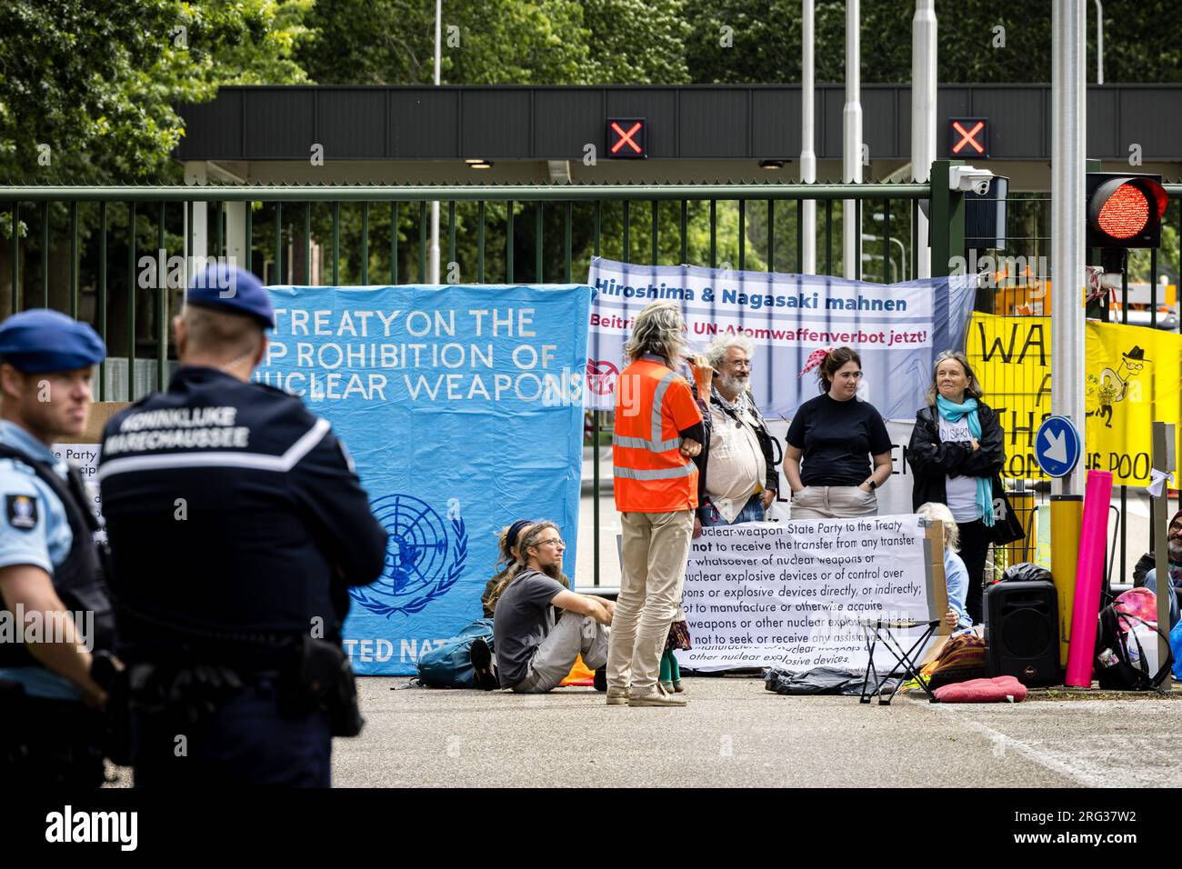 VOLKEL - Activists block the entrance to Volkel Air Base in protest ...