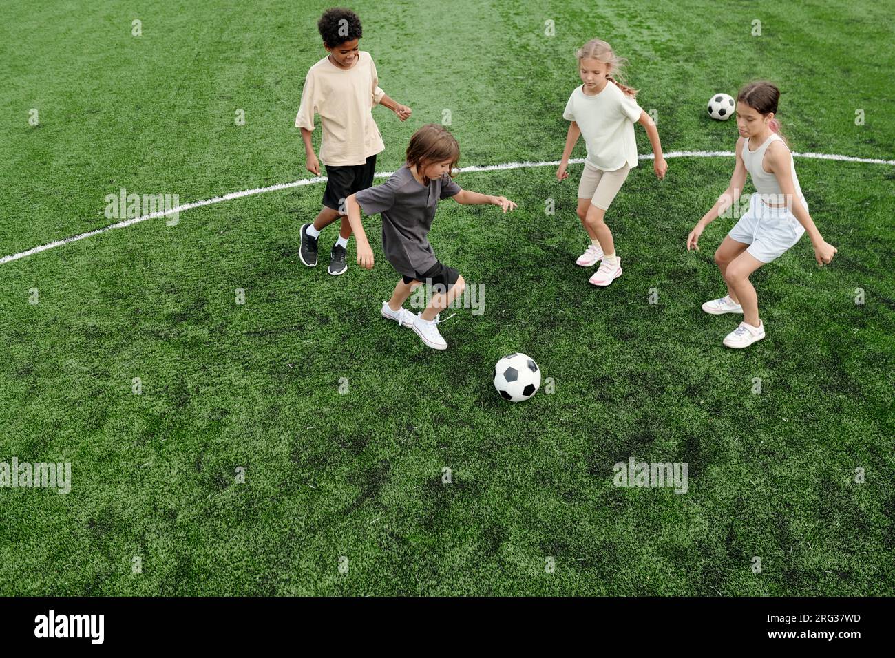 American football on field kids hi-res stock photography and images - Alamy