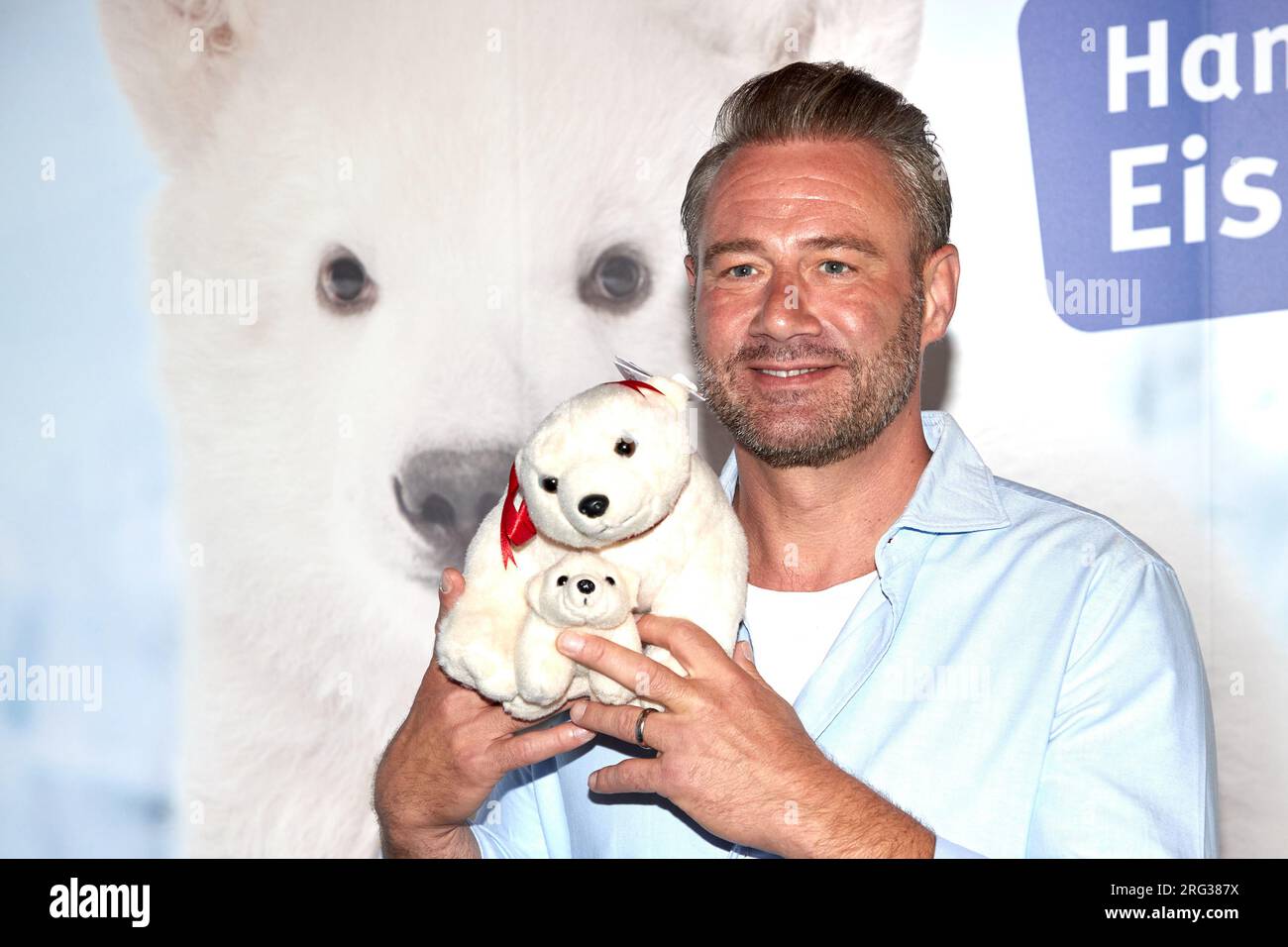 Hamburg, Germany. 07th Aug, 2023. Sasha, singer, stands with stuffed ...