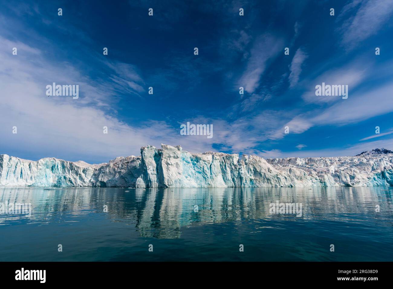 Lilliehook Glacier and its mirror reflection on arctic waters ...