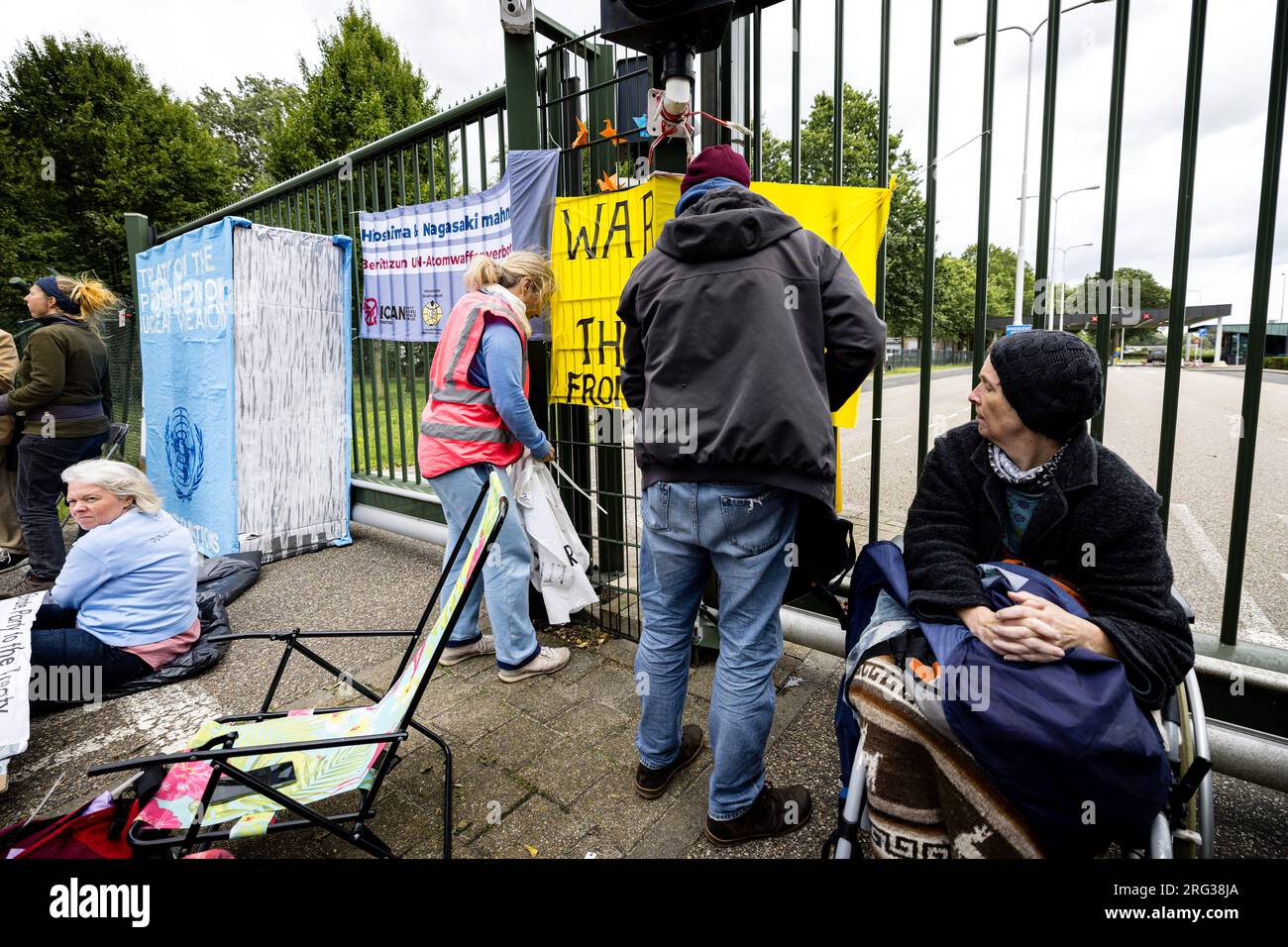 VOLKEL - Activists block the entrance to Volkel Air Base in protest ...