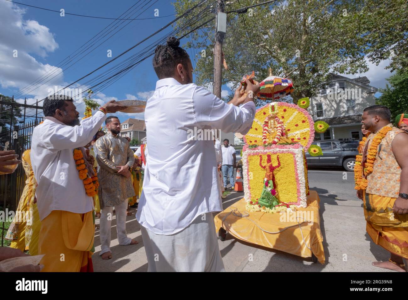 After marching from their temple for a fire walking Thimithi service at ...