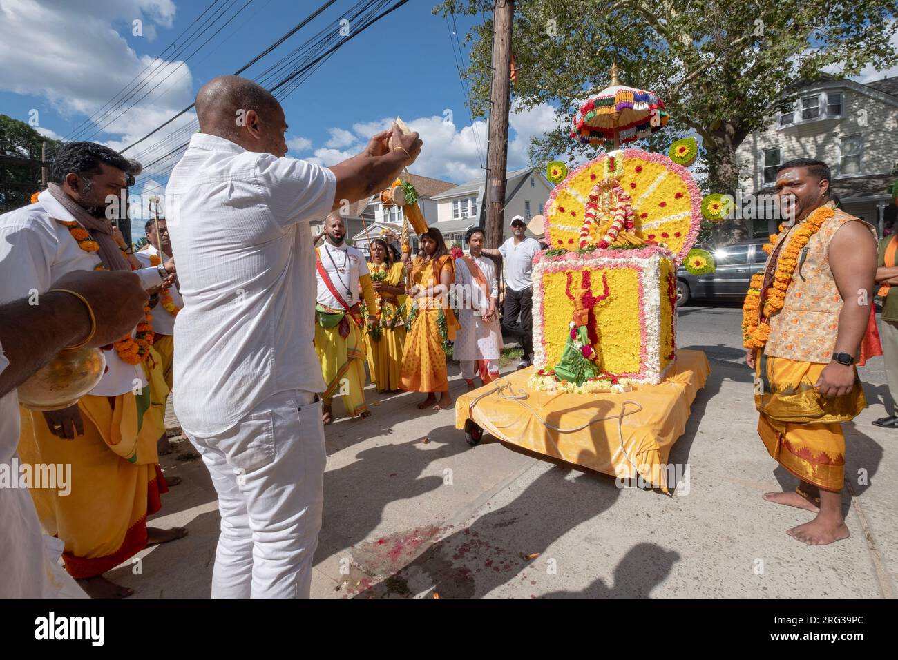 After marching from their temple for a fire walking Thimithi service at ...