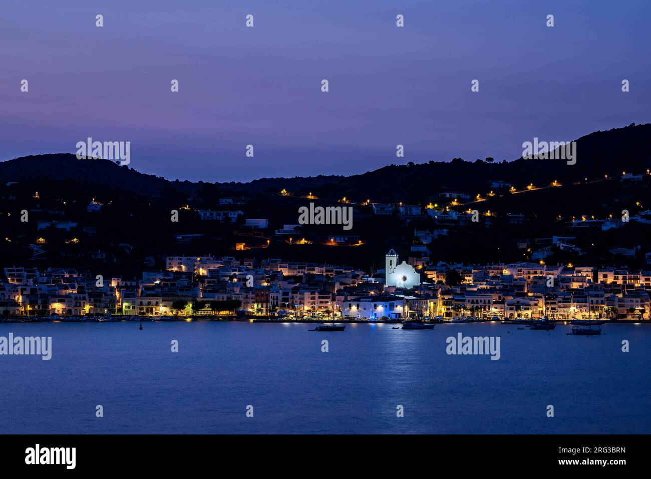 Port de la Selva bay and town still at night with the first light of ...