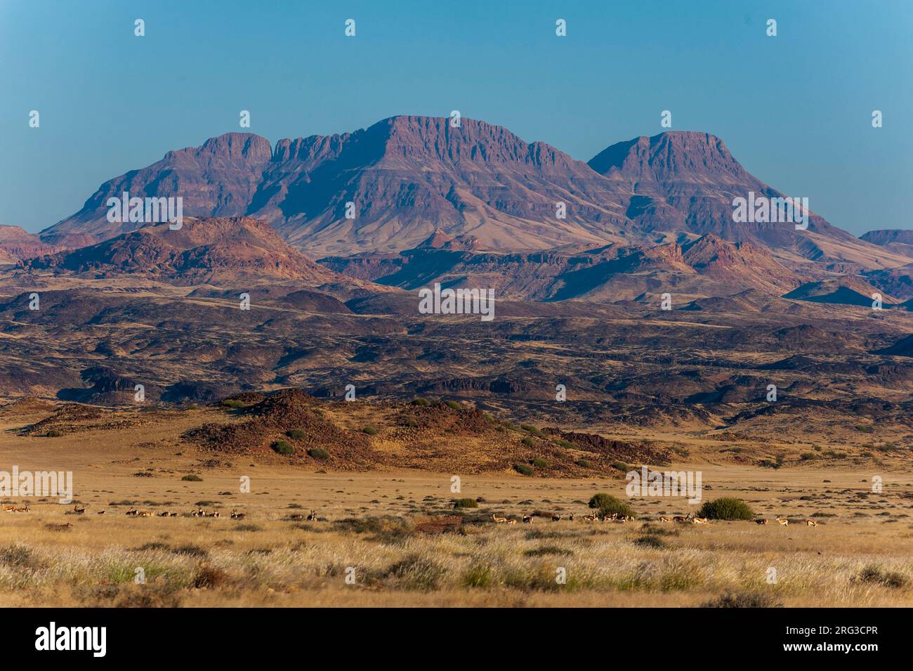 A dry river valley and the Etendeka hills in the Kunene Region. Huab ...
