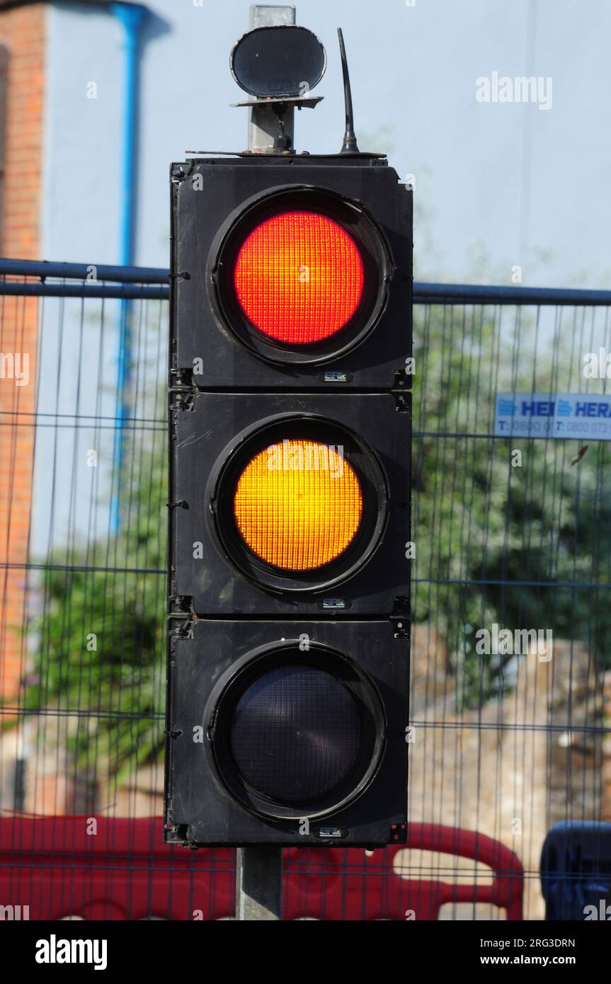 Taffic lights controlling vehicles on UK roads Stock Photo - Alamy