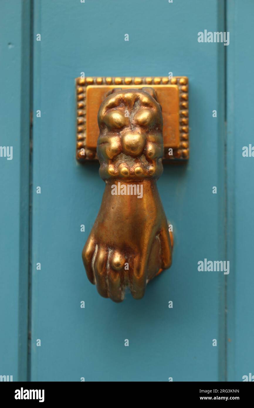Elaborate hand shaped copper door knocker (Orange, Vaucluse, France ...