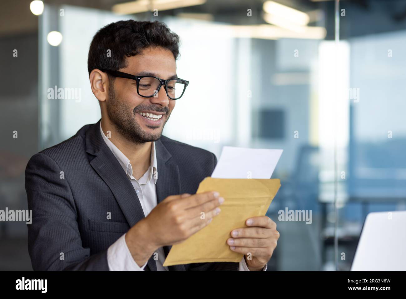 Young successful arab businessman at workplace inside office, man ...