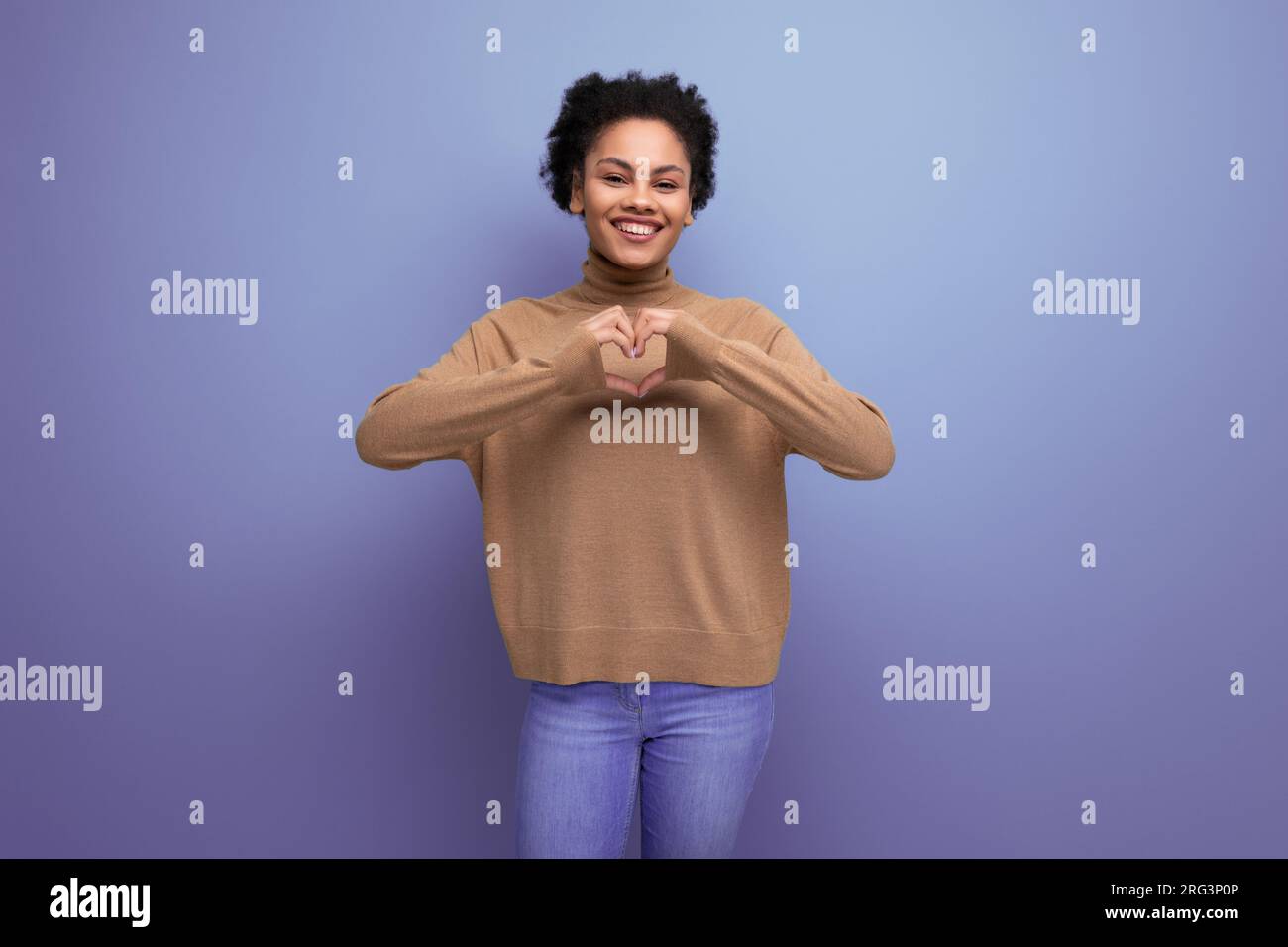 young attractive latin woman with black afro hair pulled back in ...