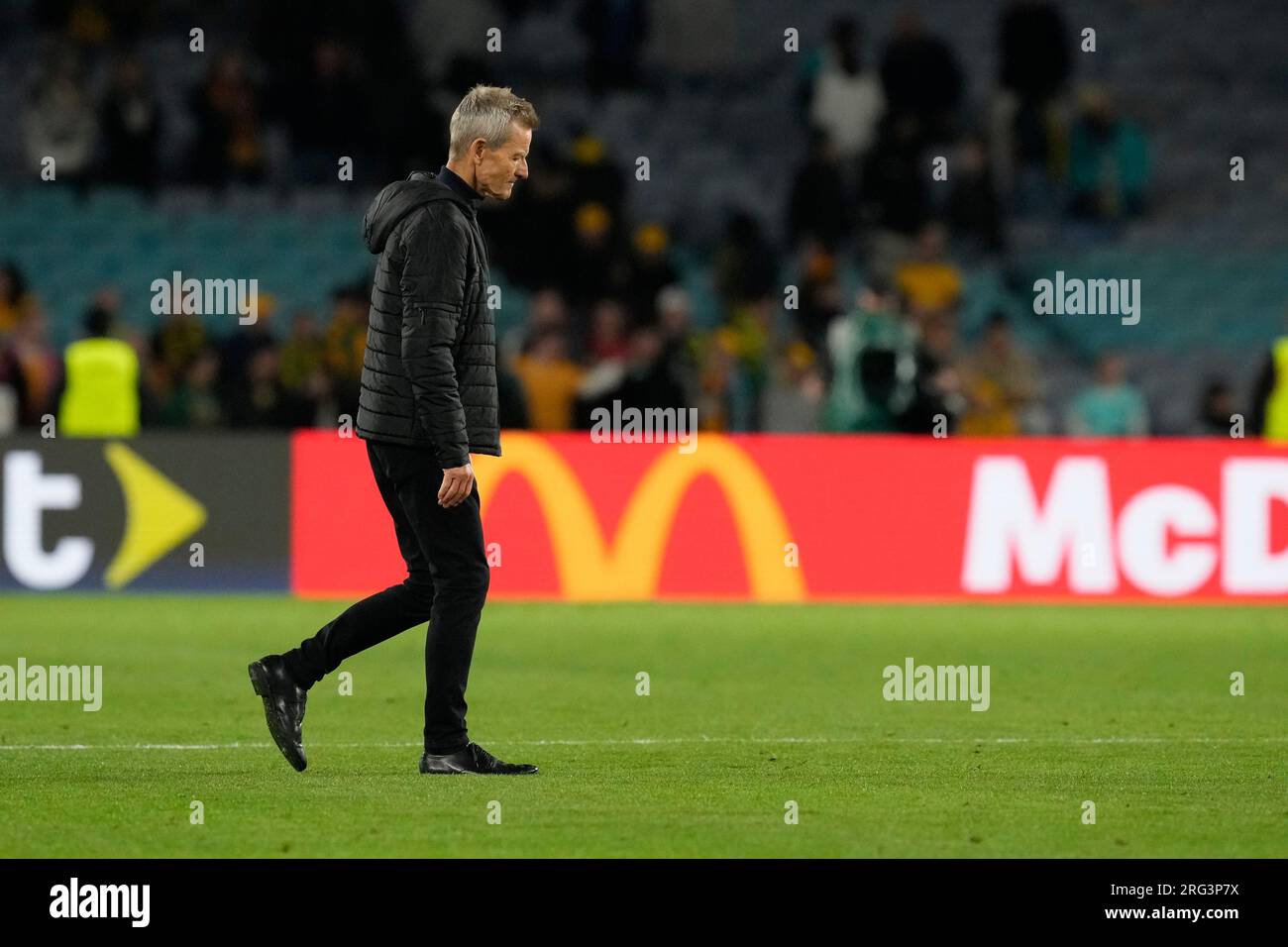 Denmark's head coach Lars Sondergaard walks on the pitch after the ...