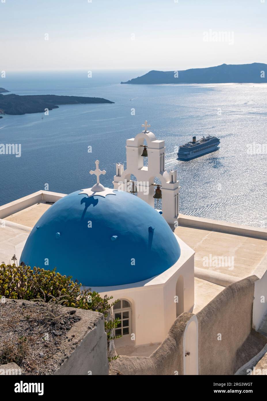 Iconic blue-domed church and belfry (Three Bells of Fira) with Costa ...