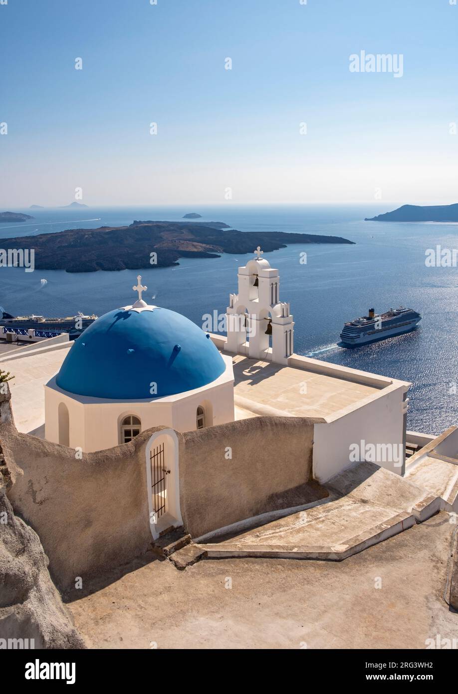 Iconic blue-domed church and belfry (Three Bells of Fira) with Costa ...