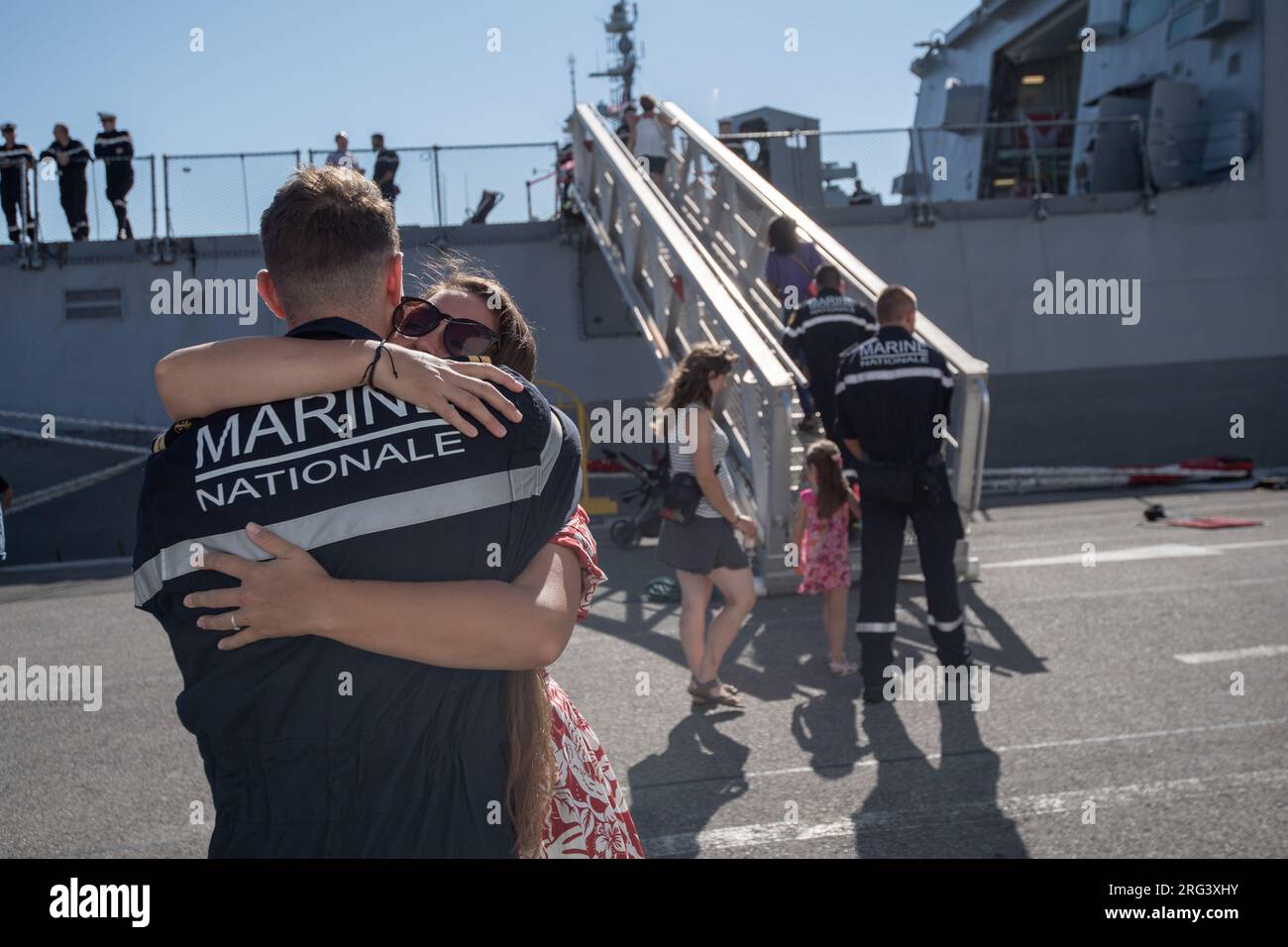 A sailor from the multi-mission frigate LORRAINE is reunited with his ...